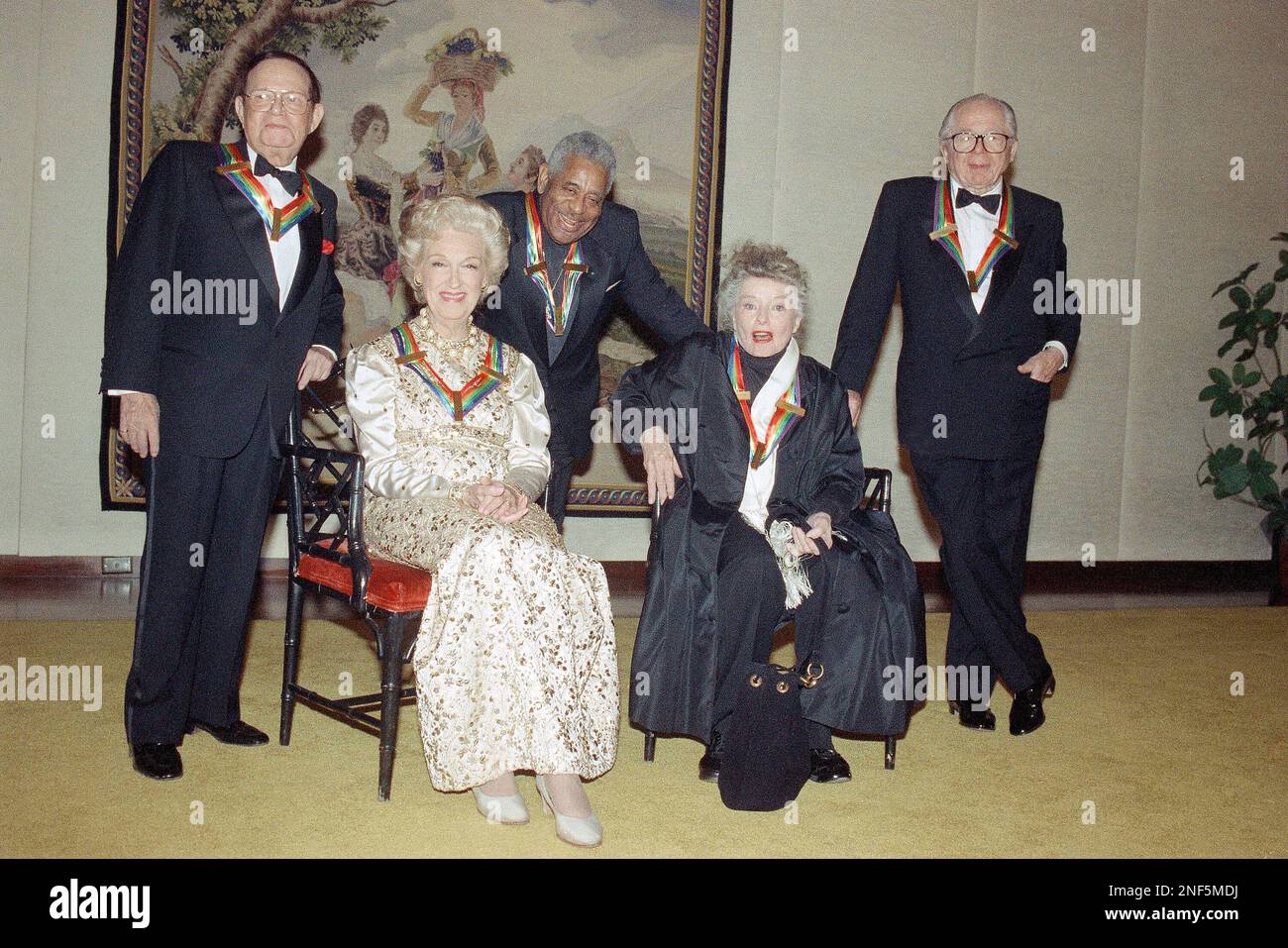 The five performers and musician pose at the Kennedy Center on Sunday ...