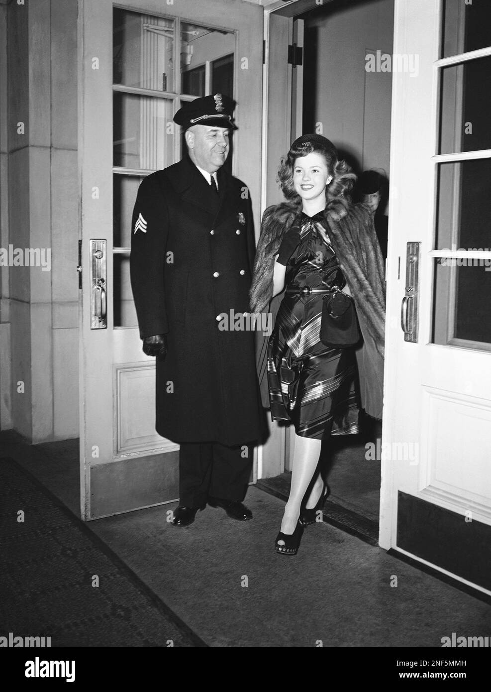 Both Sgt. Walter Grimes of the White House police and Shirley Temple ...