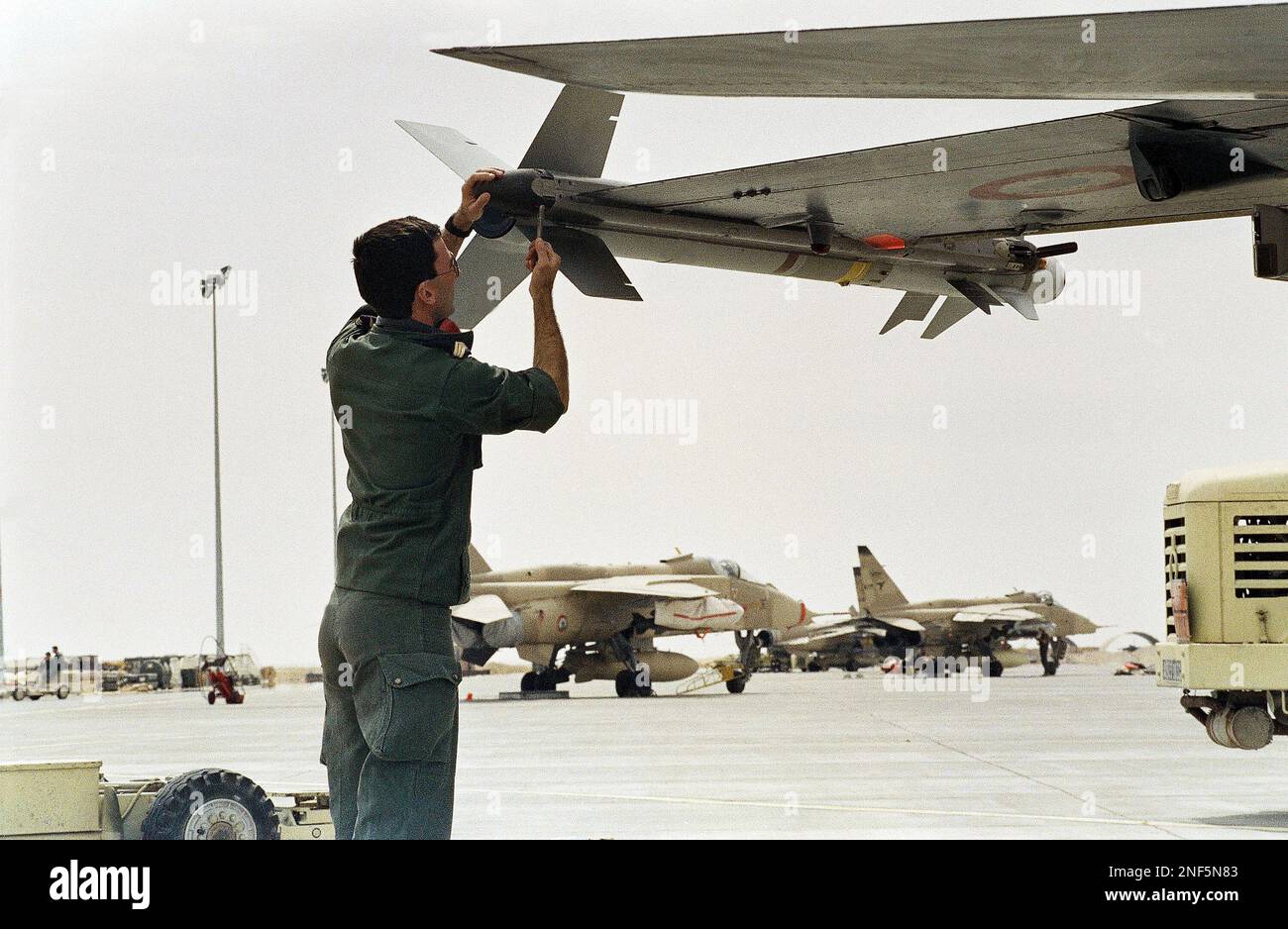 In northern Saudi Arabia a French weapons specialist adjusts a Magic II ...