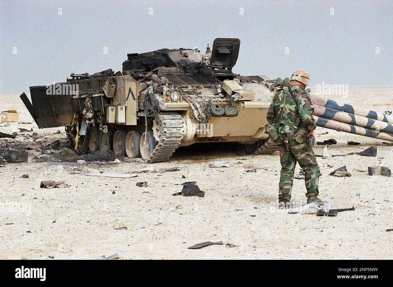 An American soldier from the U.S. Army's 1st Infantry Division looks ...