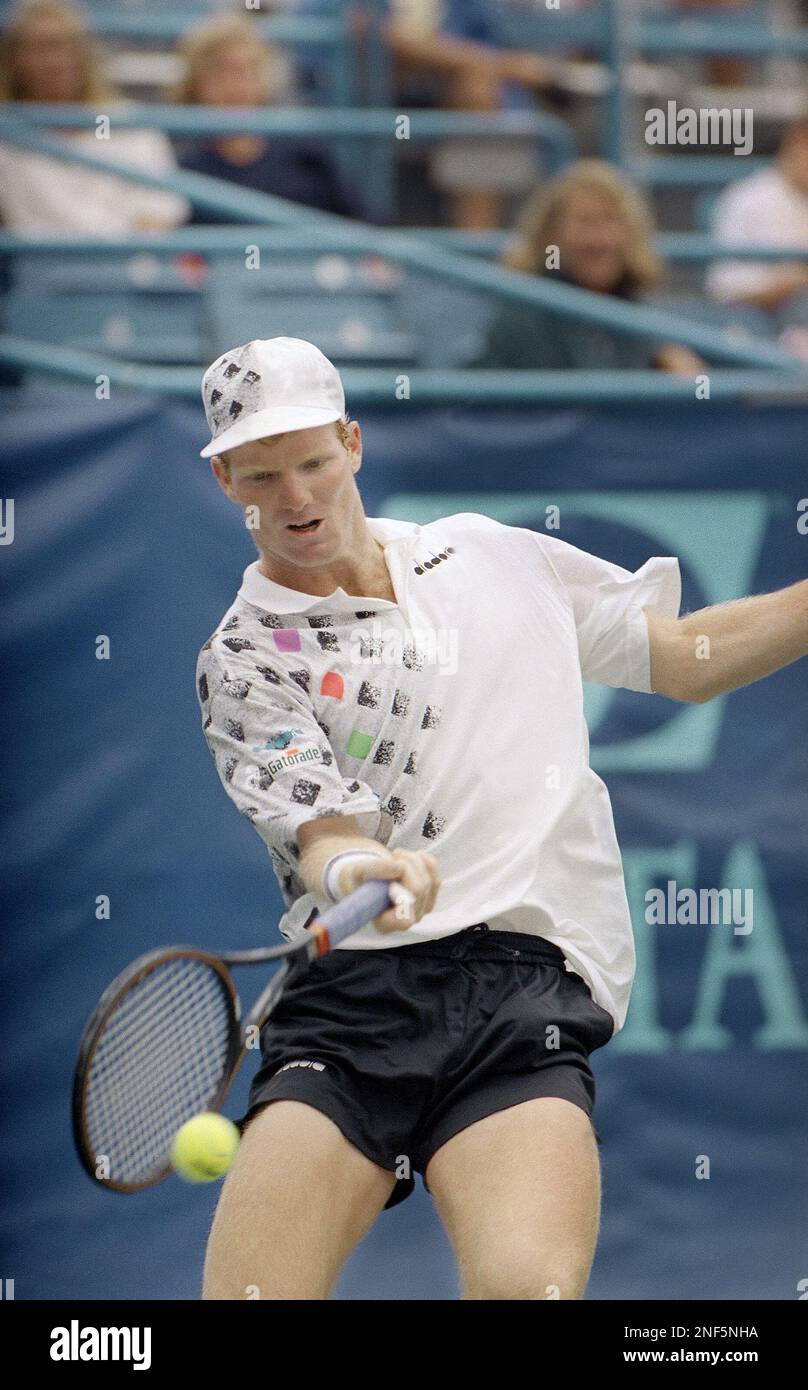 Top seed Jim Courier of Dade City, Fla., returns the ball towards ...