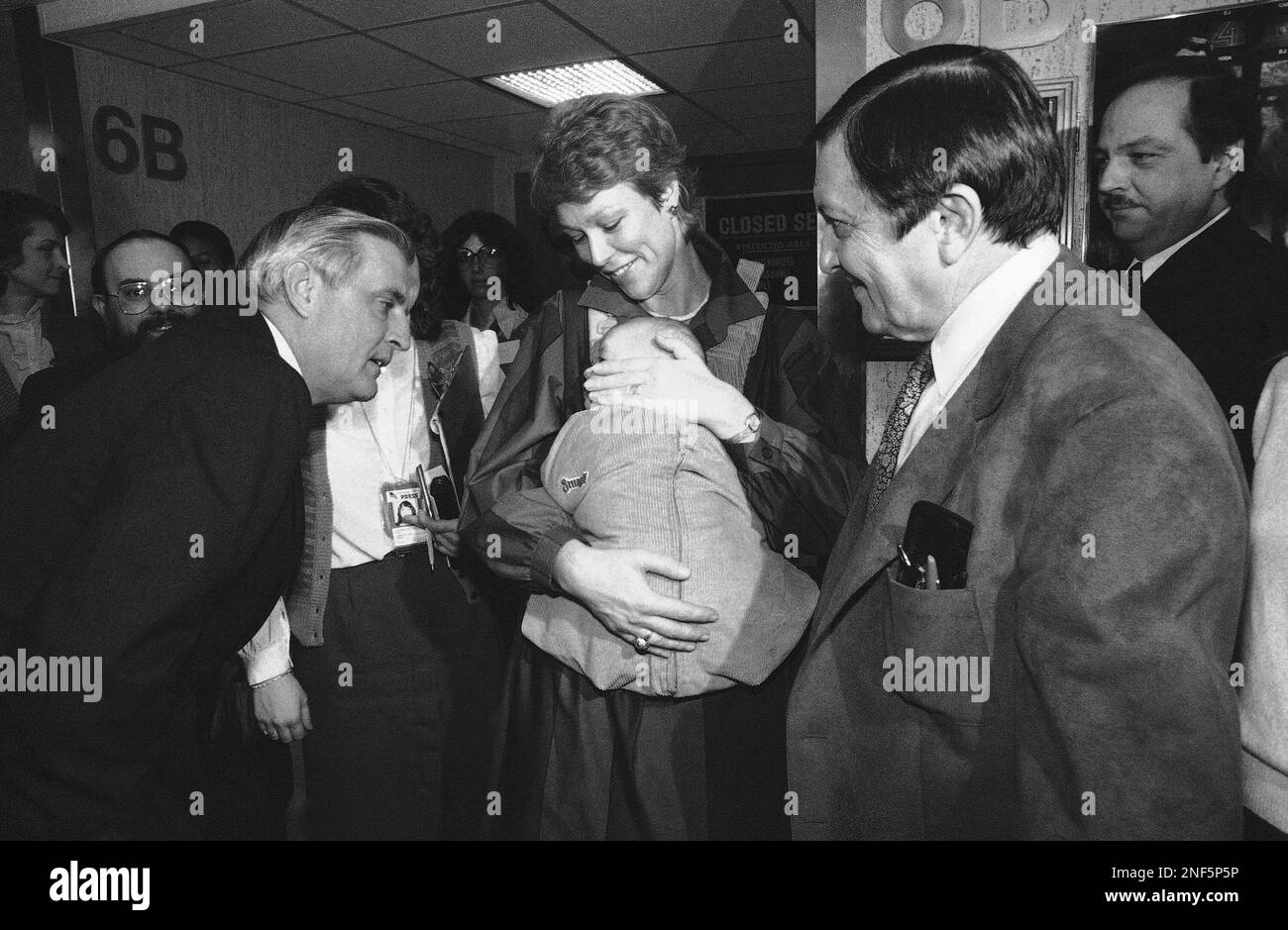Walter Mondale, Democratic presidential contender, left, greets two ...