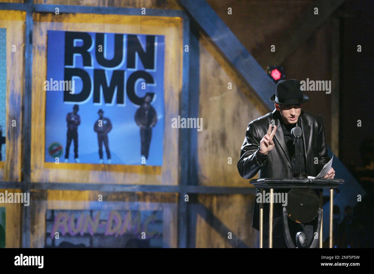 Eminem inducts Run D.M.C. into the Rock and Rock Hall of Fame at the ...