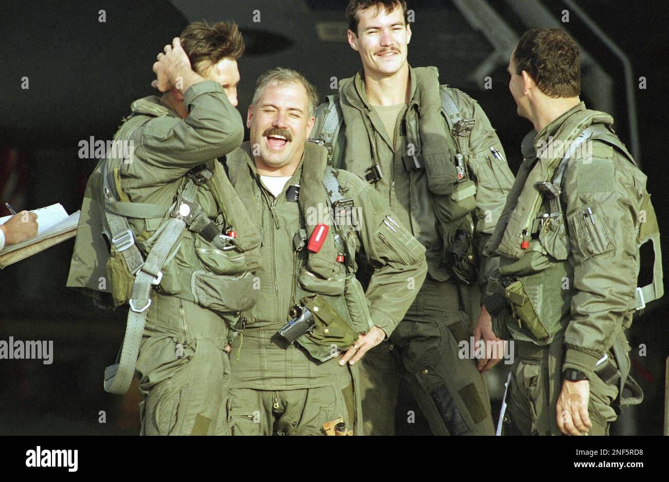 U.S F-16 pilots relax shortly after arriving back from bombing missions ...
