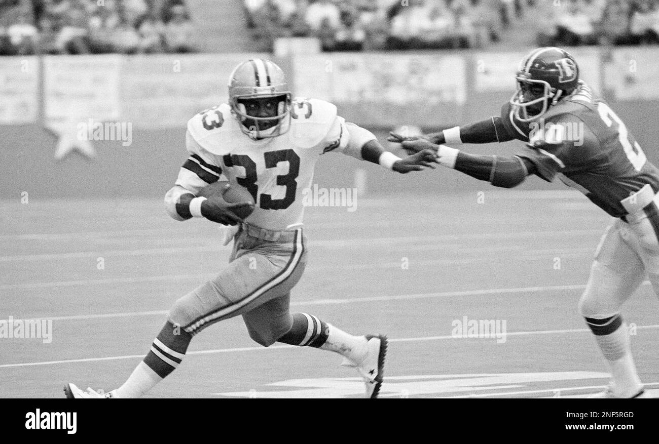 Tony Dorsett (33), Dallas Cowboys running back is tackled by Billy ...