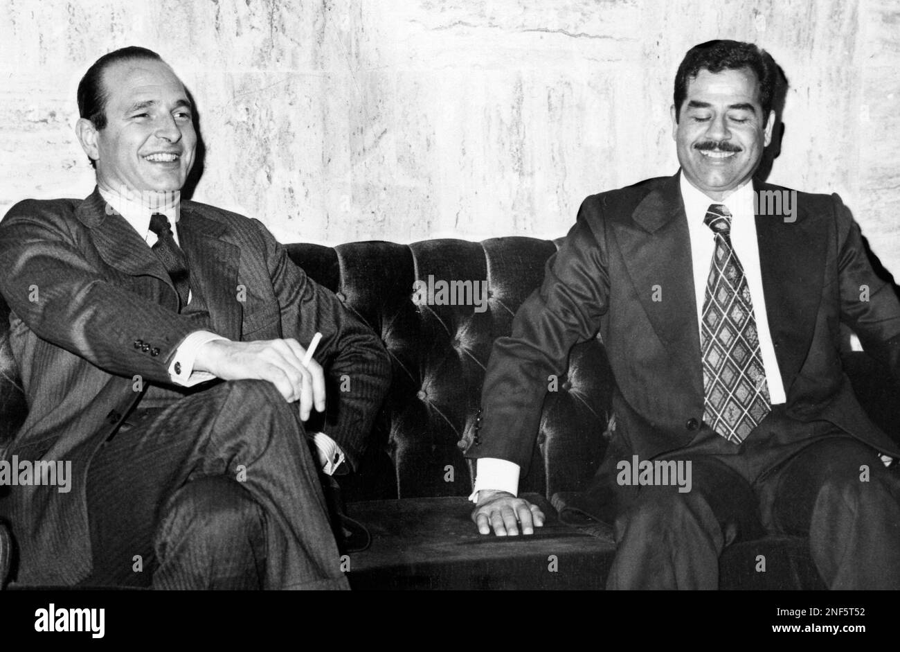 French Prime Minister Jacques Chirac, left, and Iraqi leader Saddam ...