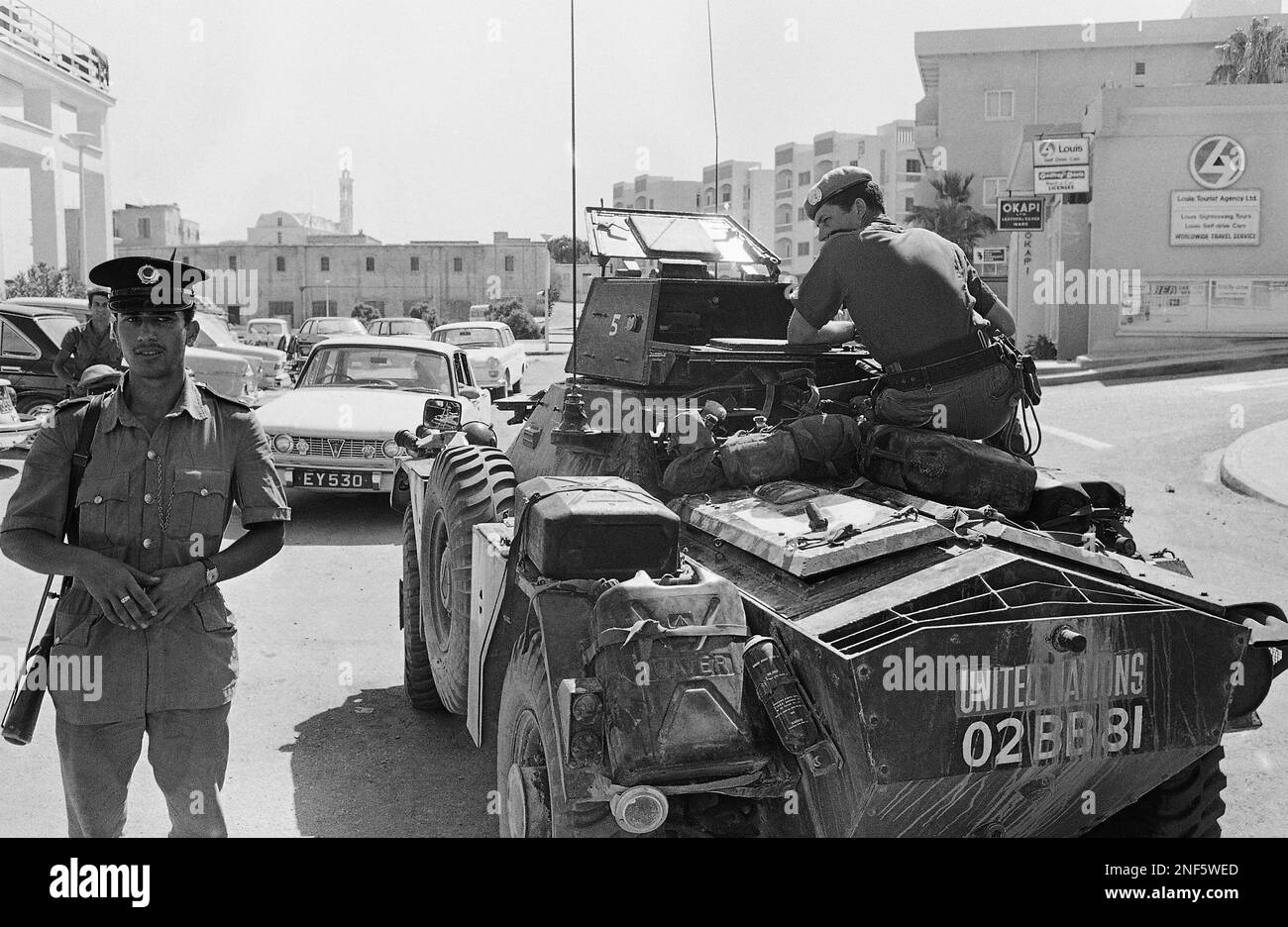 UN armored cars prepare to move out on patrol of cease-fire lines from ...