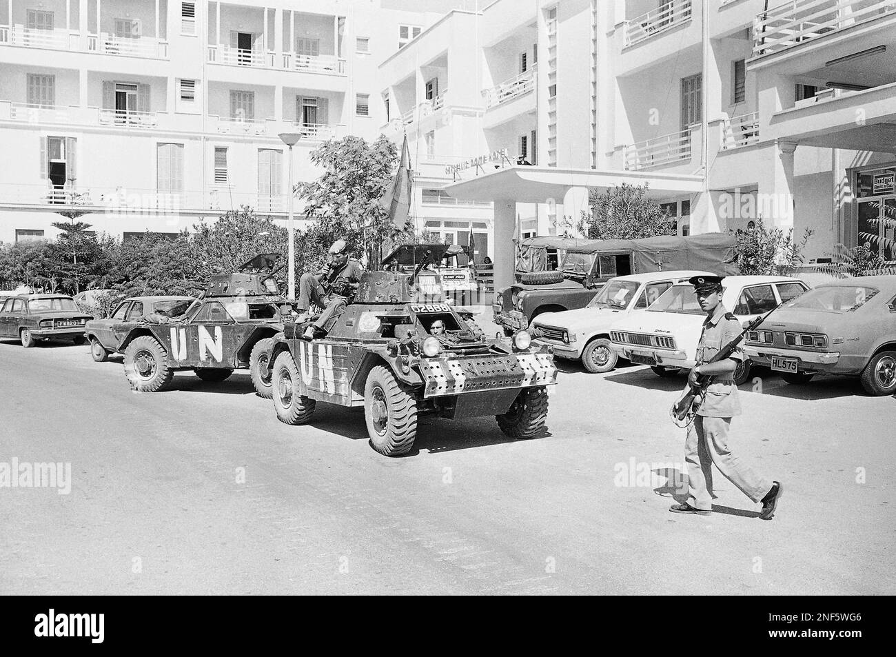 UN armored cars prepare to move out on patrol of cease-fire lines from ...