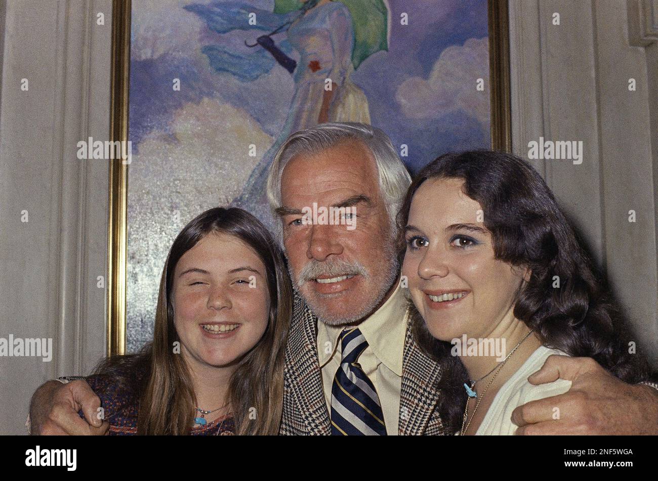 Actor Lee Marvin is shown with his daughters, Kerry, 13, left, and ...