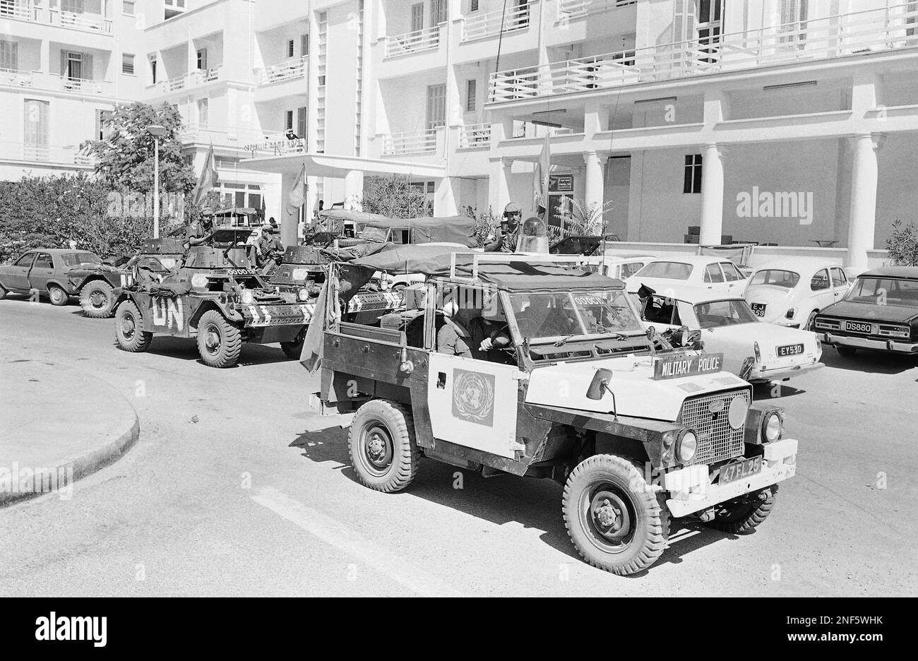UN armored cars prepare to move out on patrol of cease-fire lines from ...
