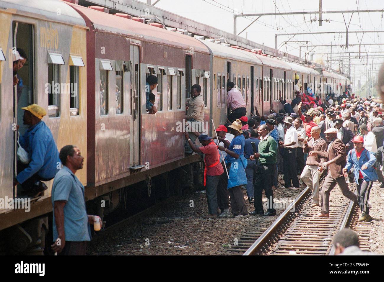 ANC affiliated Railway and Harbour workers board a train at Germiston ...