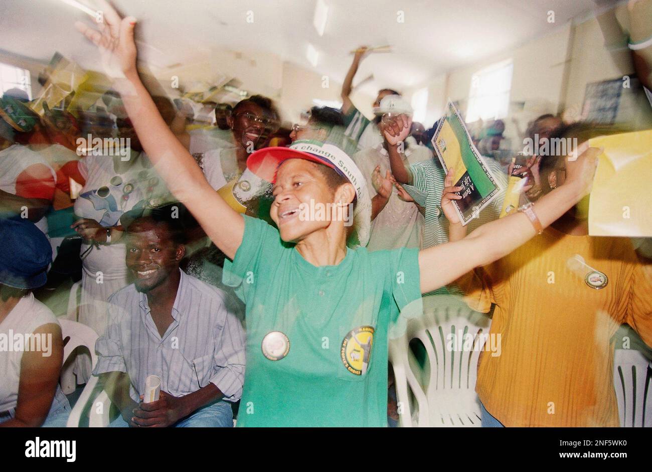 A supporter of African National Congress President Nelson Mandela signs ...