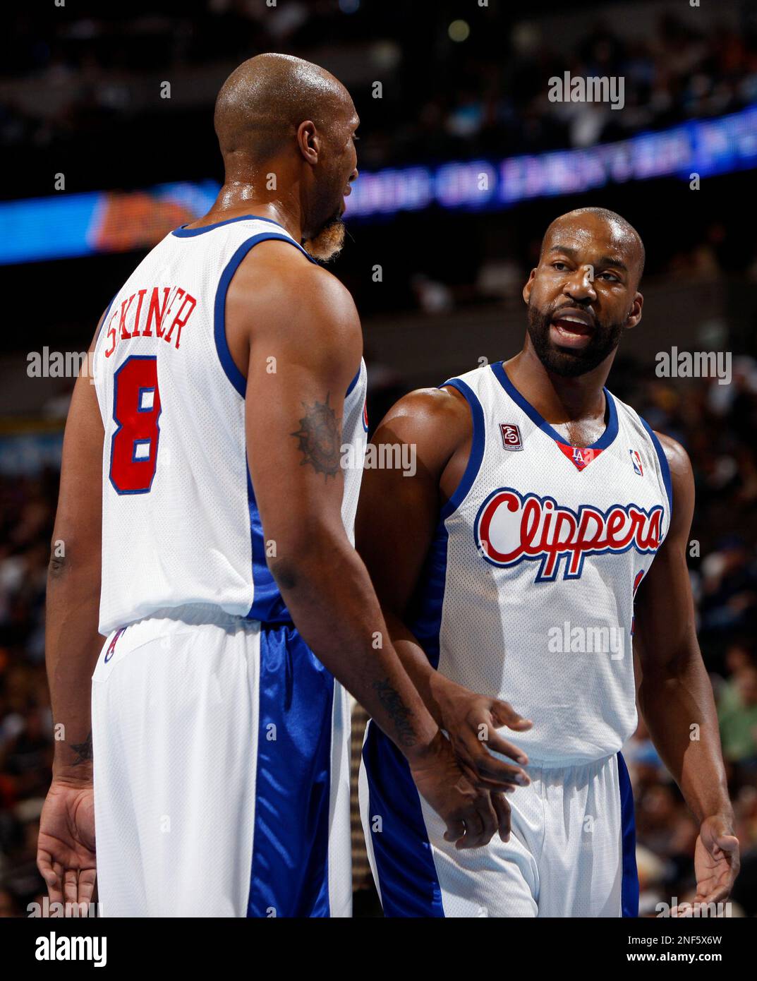 Los Angeles Clippers center Brian Skinner, left, talks with guard Baron ...
