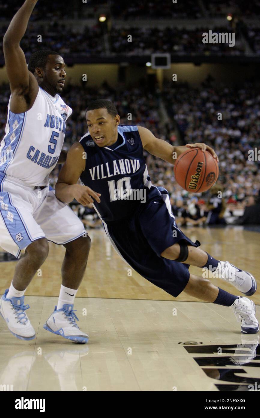 Villanova's Corey Fisher drives on North Carolina's Ty Lawson in a men ...