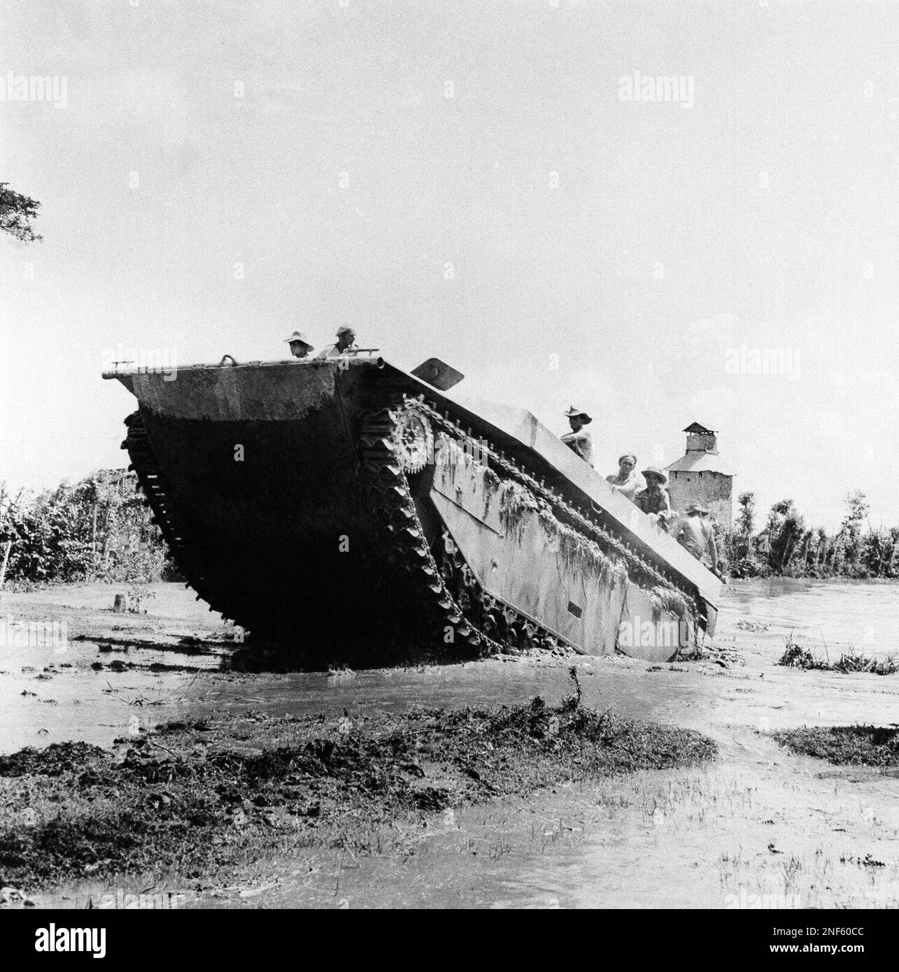Am-tracks, American built amphibious vehicles shown in action as French ...