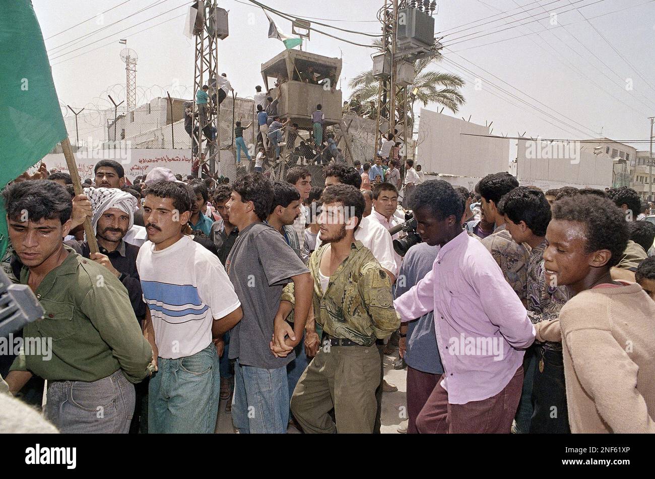 Palestinians dance the traditional Debka dance, May 11, 1994, in the ...