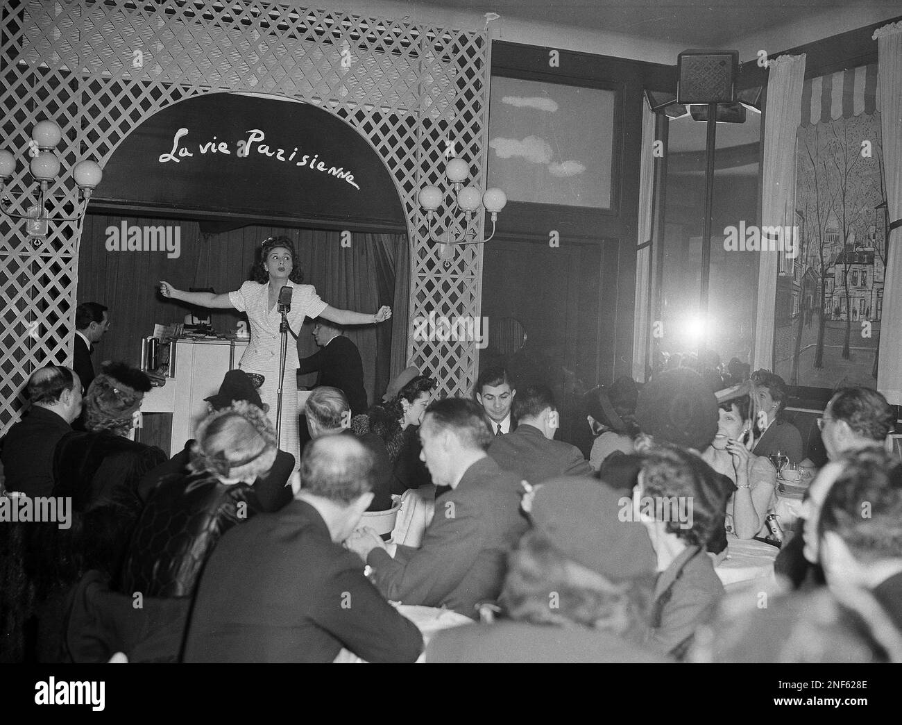 A blues singer "gives out" to a crowded house at Arthur Loesser's La ...