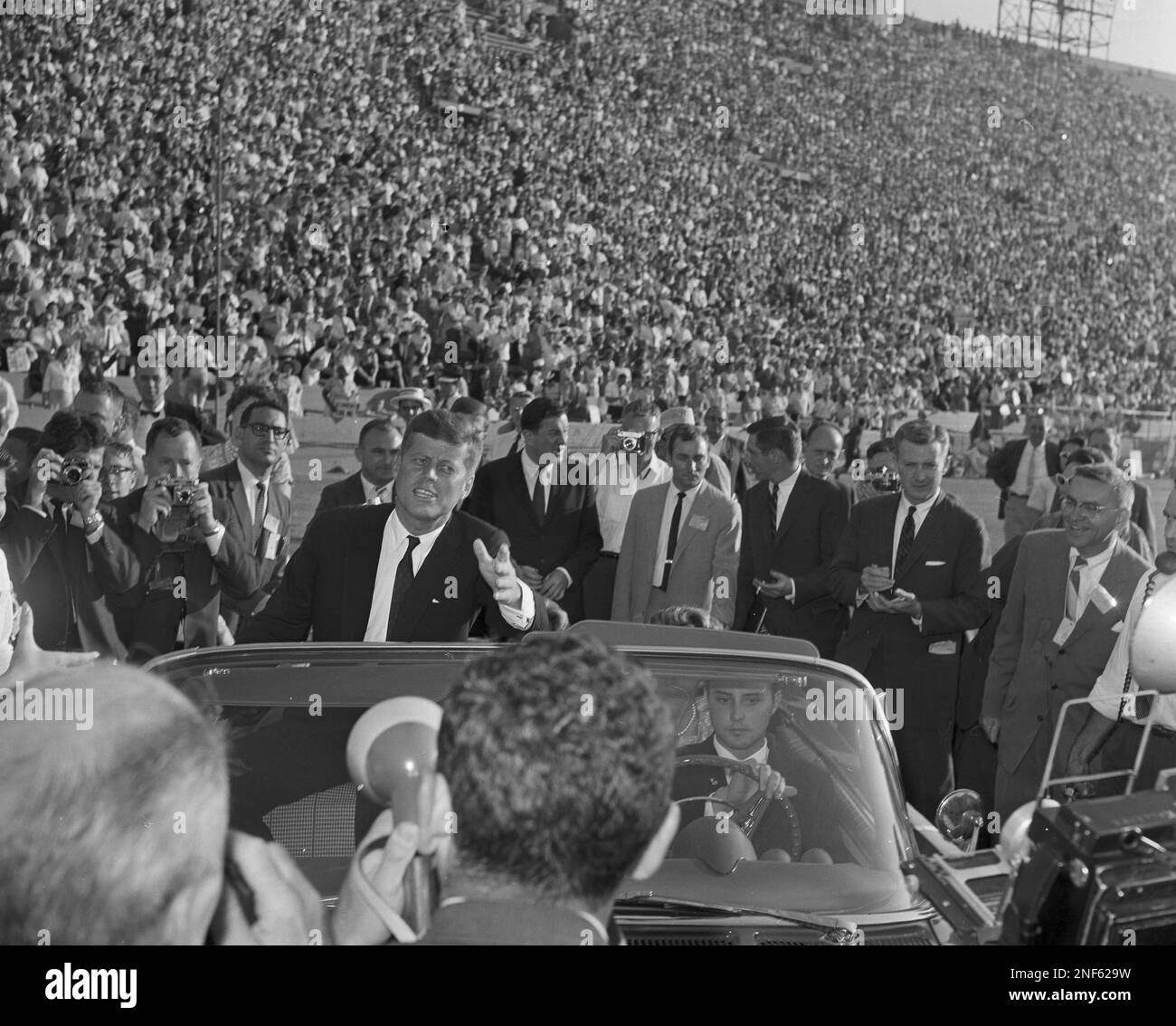 Sen. John F. Kennedy arrives in the Los Angeles Coliseum to accept the ...