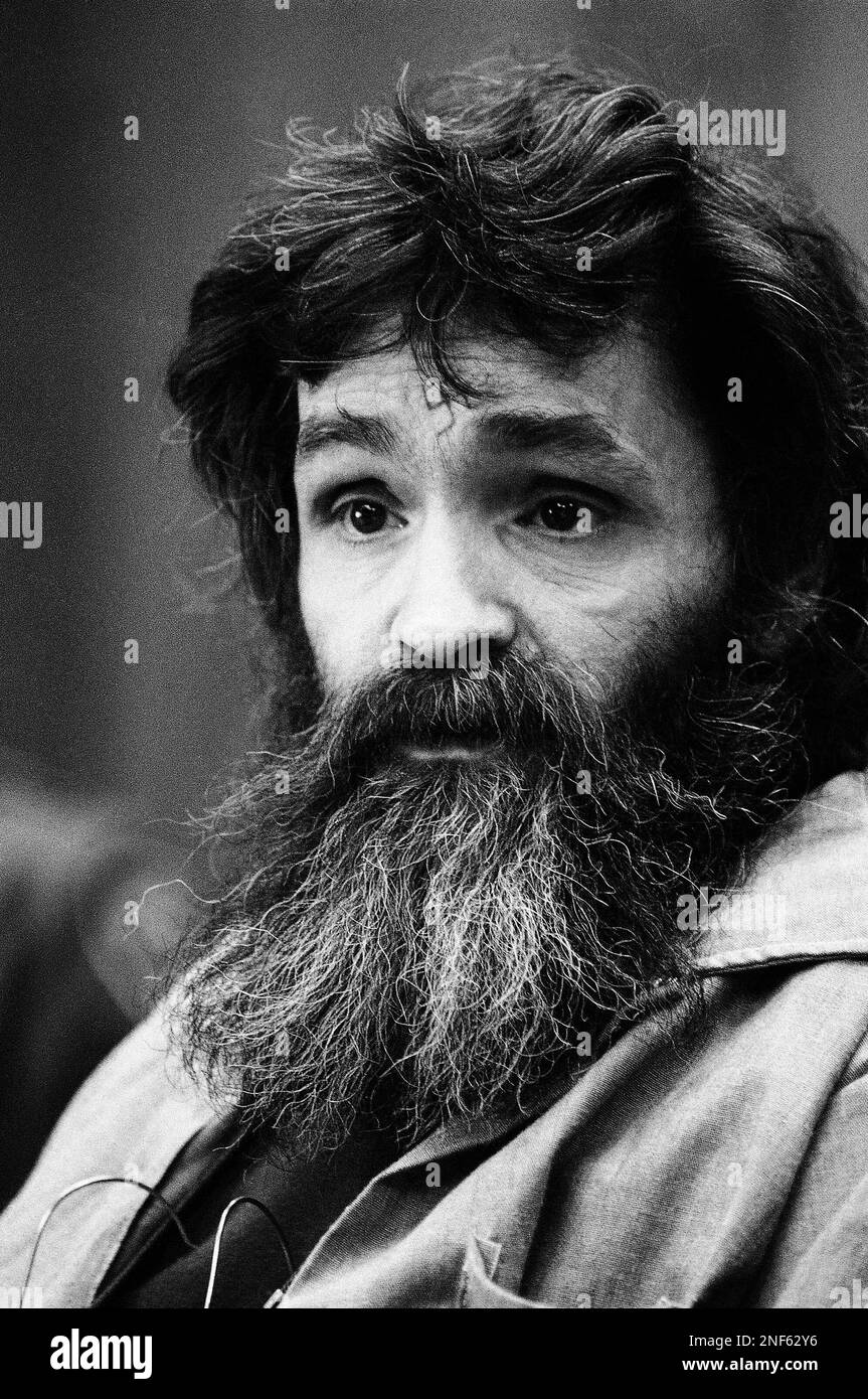 Wearing a swastika on his forehead, convicted mass murderer Charles ...