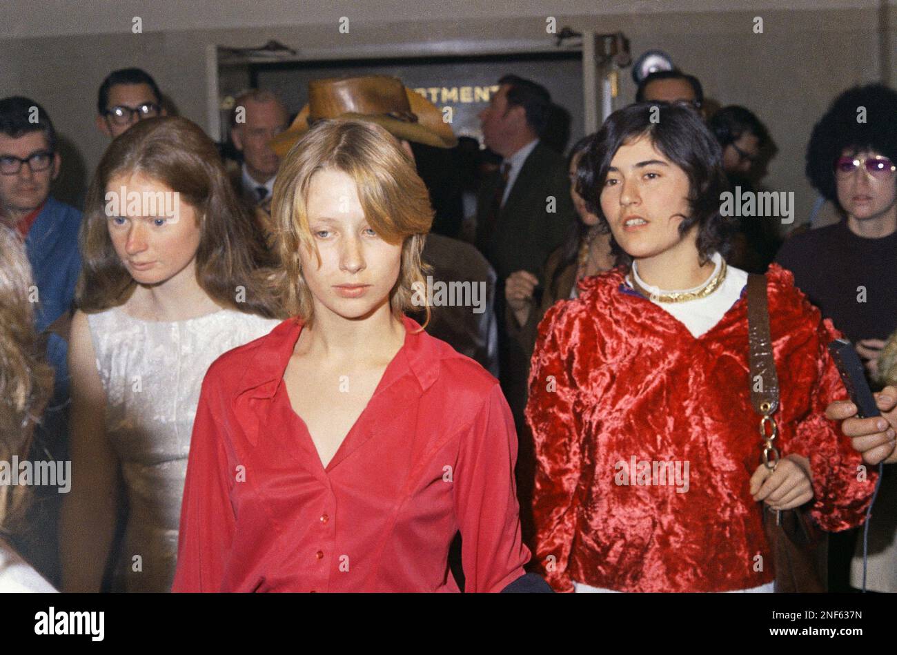 Members of Charles Manson's "family" are shown outside the courtroom in ...