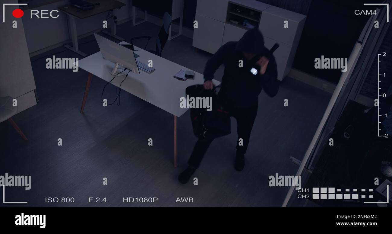 Thief Stealing Computer From Office At Night Stock Photo - Alamy