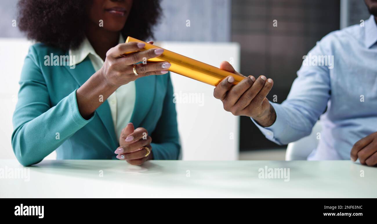 Business Man And Woman Relay Baton Handover And Pass Stock Photo - Alamy
