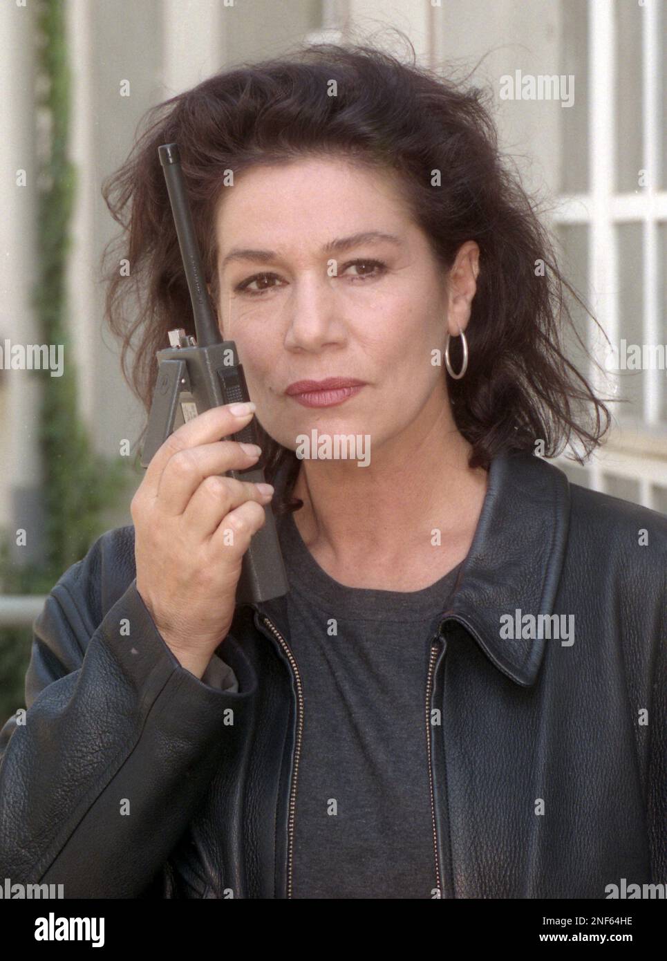 Portrait of German actress Hannelore Elsner, holding a mobile phone, is ...