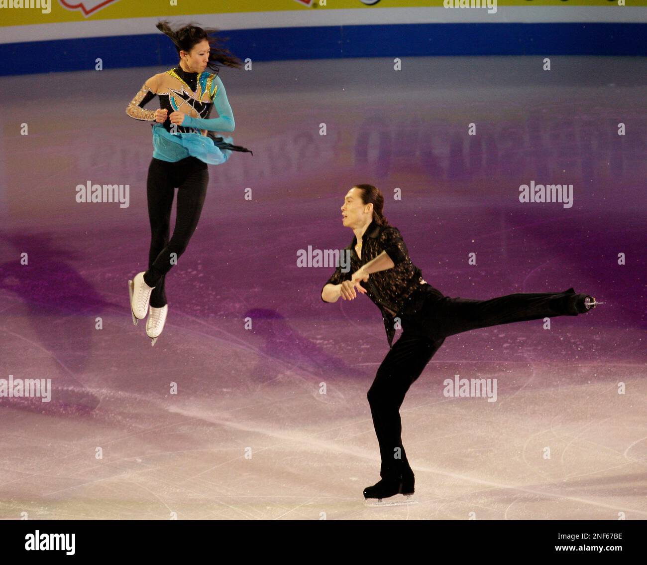 Pairs team Pang Qing and Tong Jian of China, skate during the ...