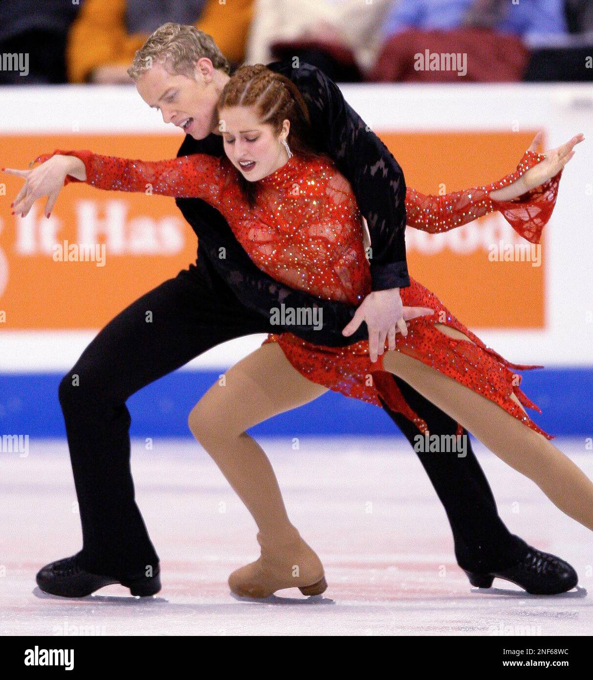 Emily Samuelson and Evan Bates, of the United States, skate in the ice ...
