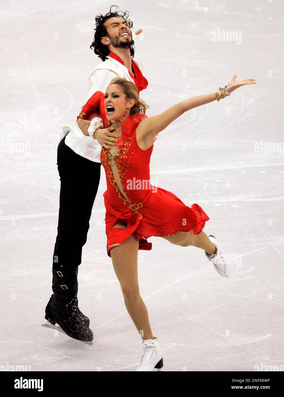 Tanith Belbin and Benjamin Agosto of the United States, skate during ...