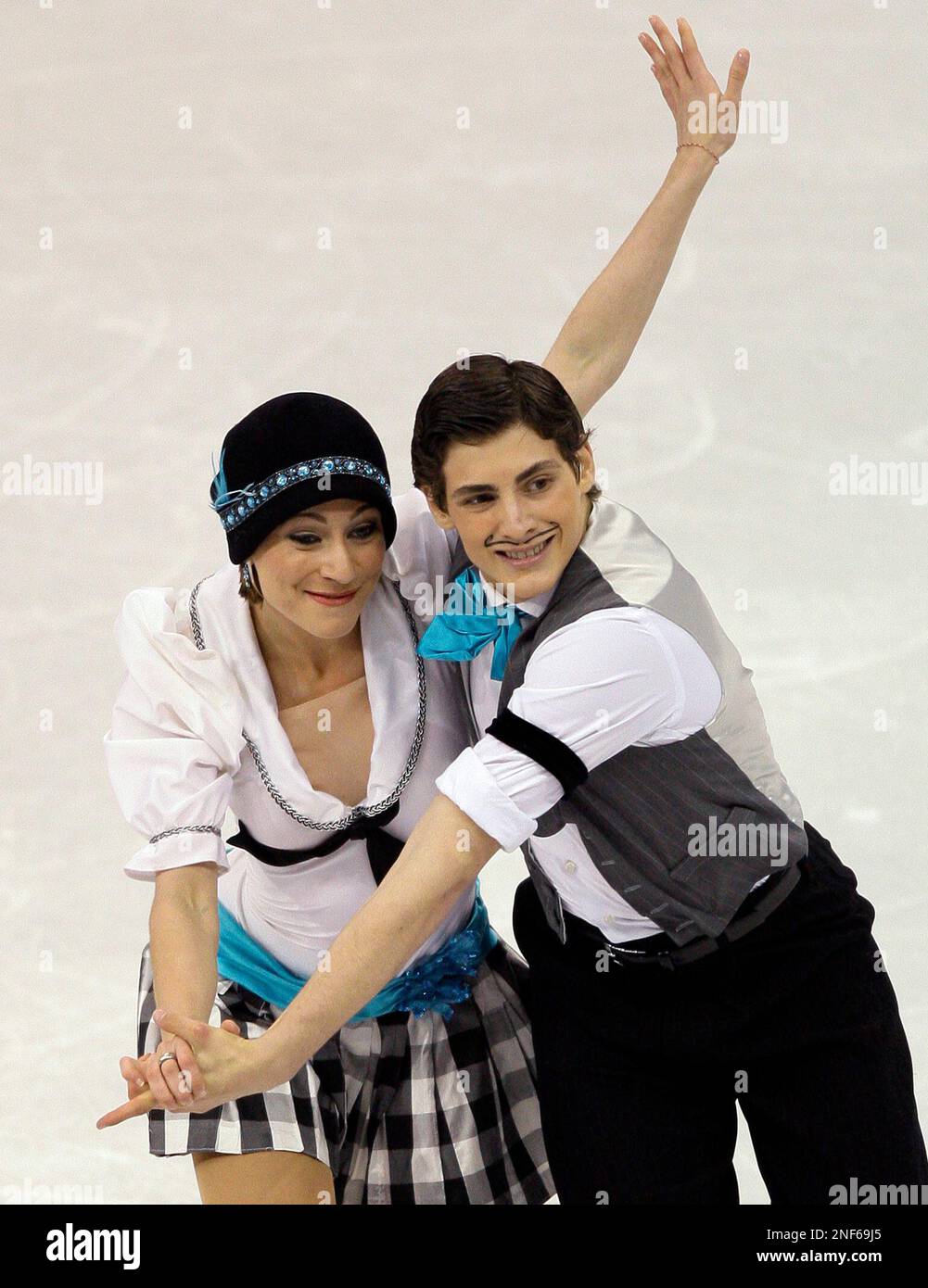 Vanessa Crone and Paul Poirier of Canada, skate during the ice dance ...