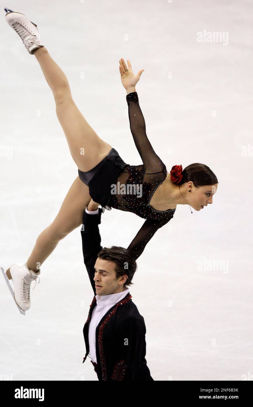 Jessica Dube and Bryce Davison of Canada, skate during the pairs free ...
