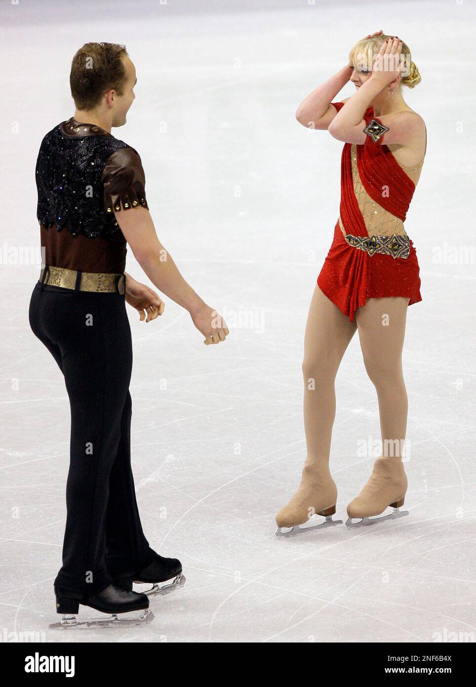 Caydee Denney and Jeremy Barrett of the United States, react after ...