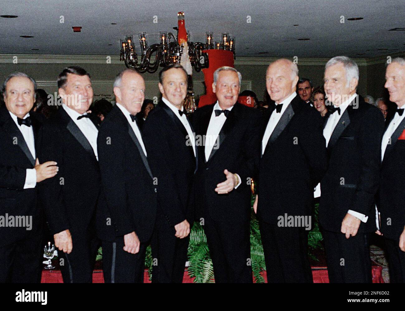 Barron Hilton, center, poses with the surviving members of the original ...