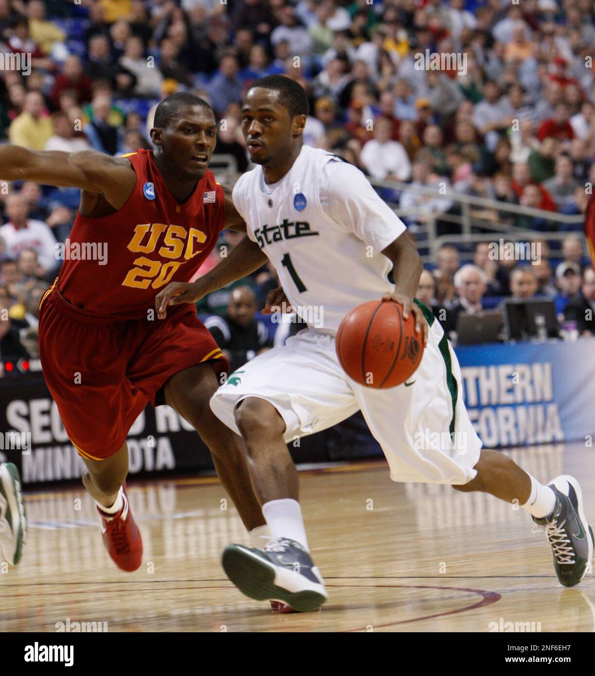 Michigan State's Kalin Lucas (1) tries to drive past Southern ...
