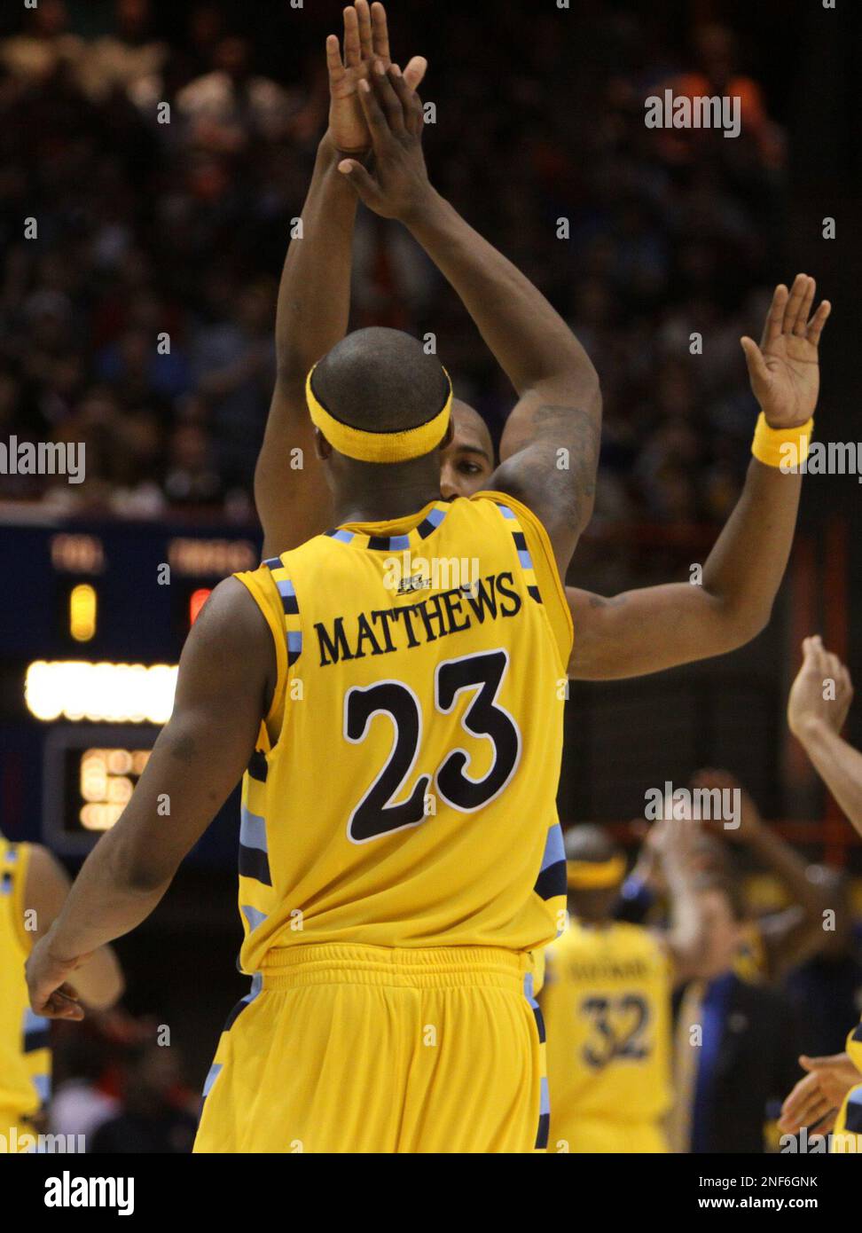 Marquette guard Wesley Matthews (23) celebrates with Marquette guard ...