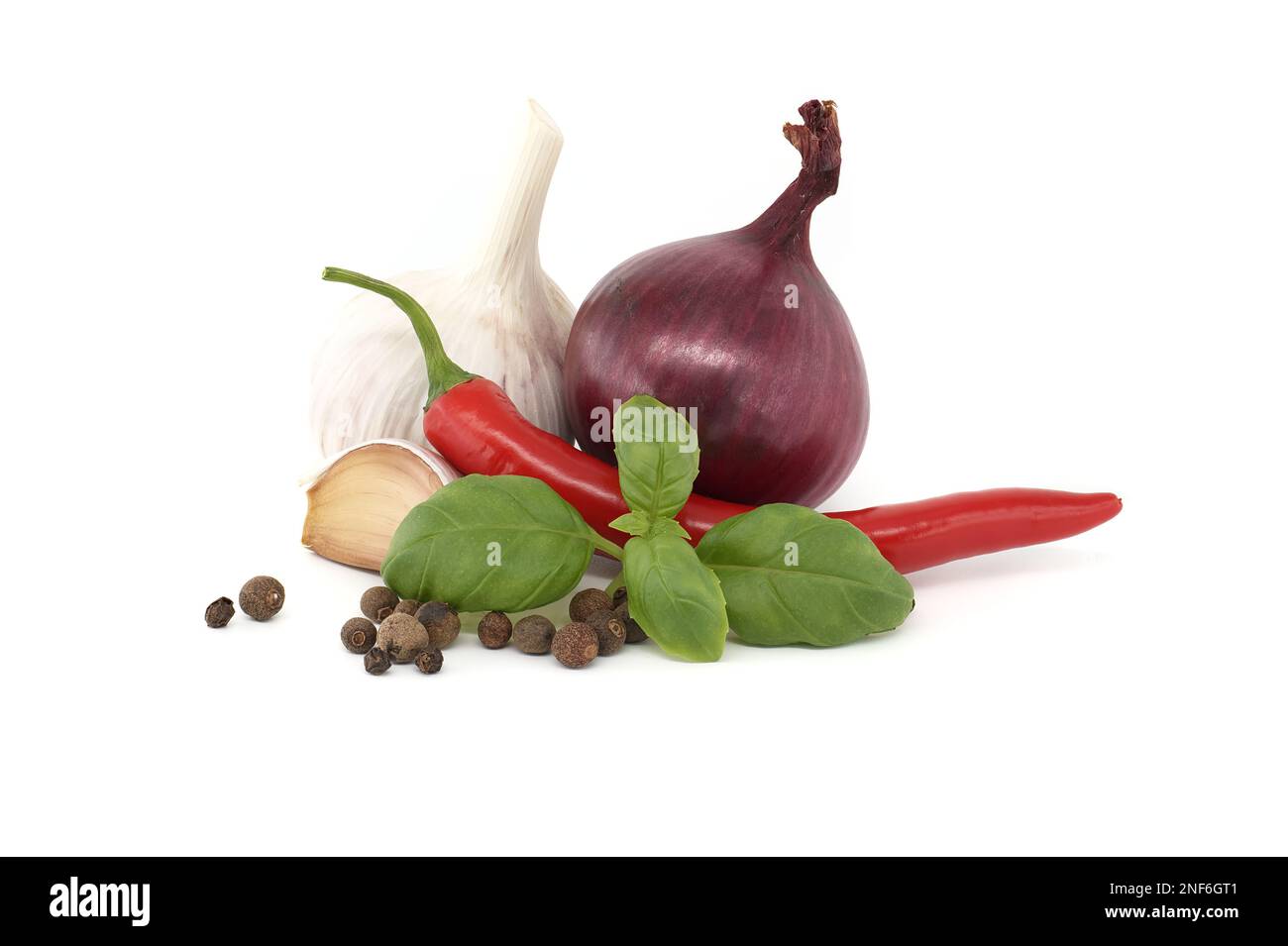Spices and flavoring theme still life with red onion, chili pepper ...