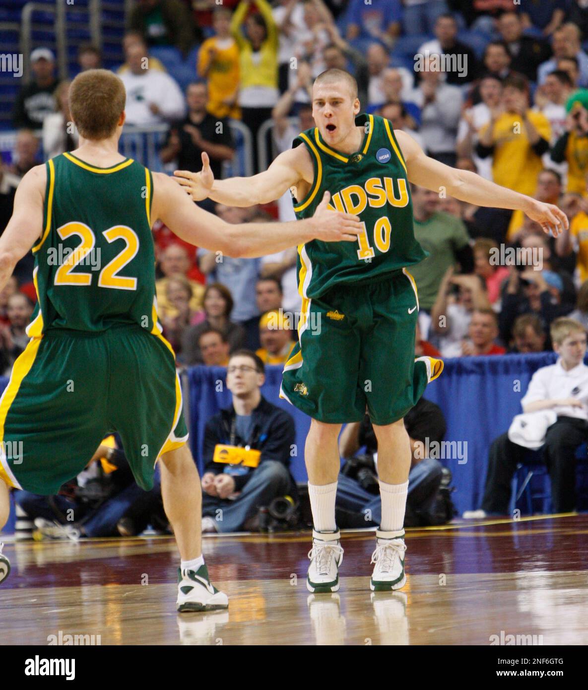 North Dakota State's Ben Woodside (10) celebrates with Brett Winkelman ...