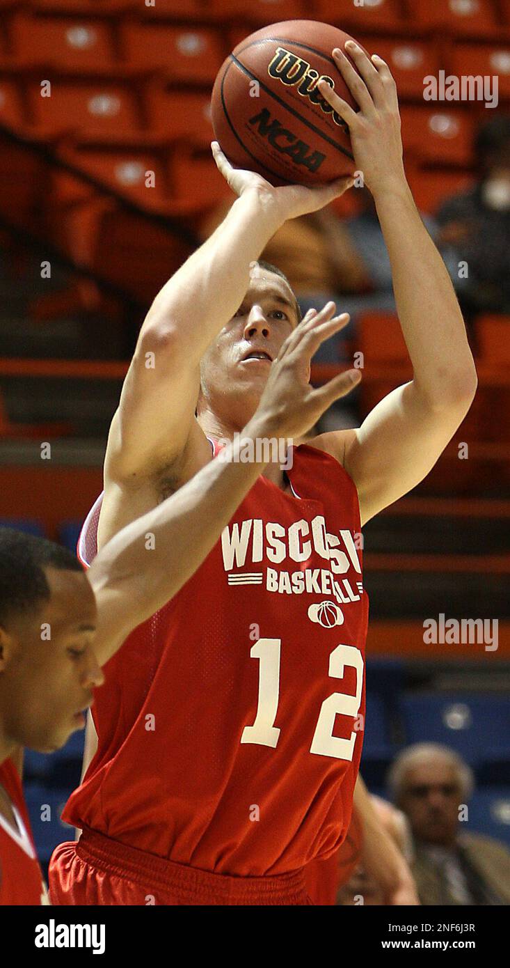 Wisconsin guard Jason Bohannon (12) shoots during practice for a first ...