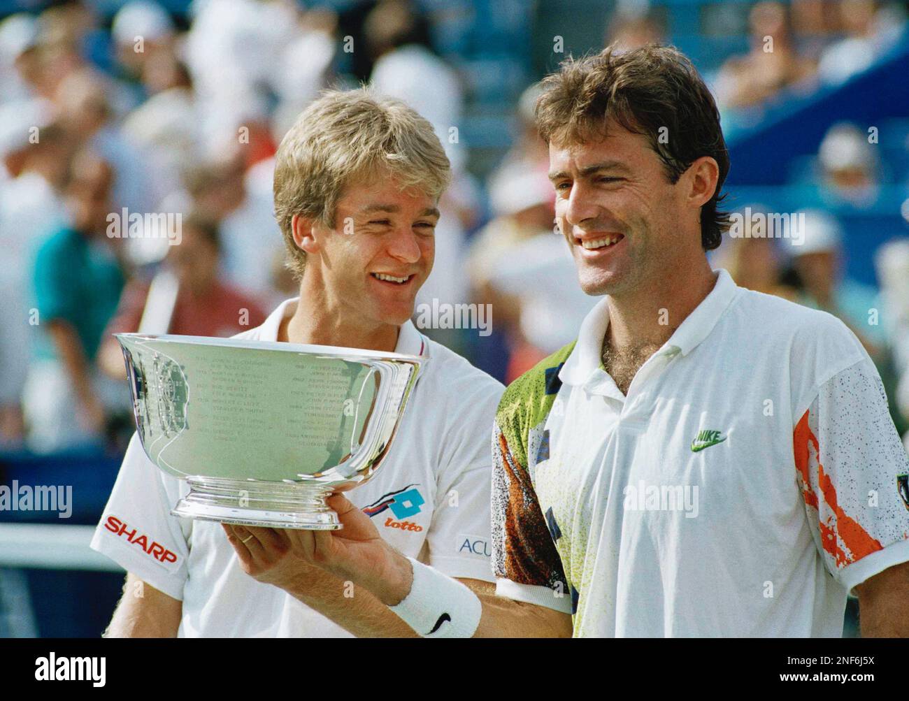 Jarryd Anders of Sweden, left, and John Fitzgerald of Australia hold up ...