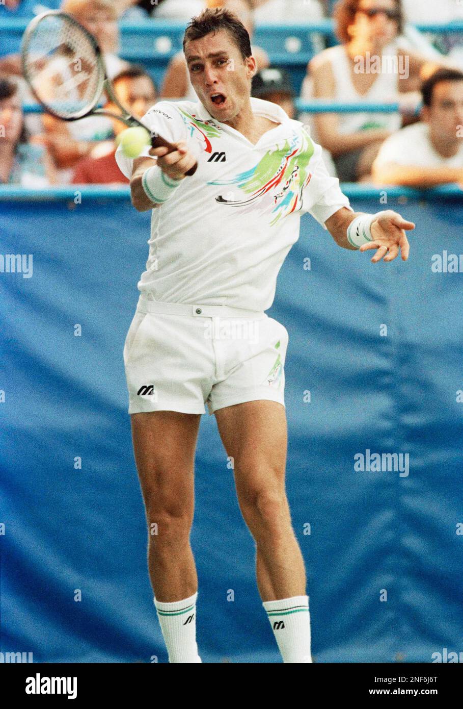 Ivan Lendl hits a forehand against Australia's Todd Woodbridge on the ...