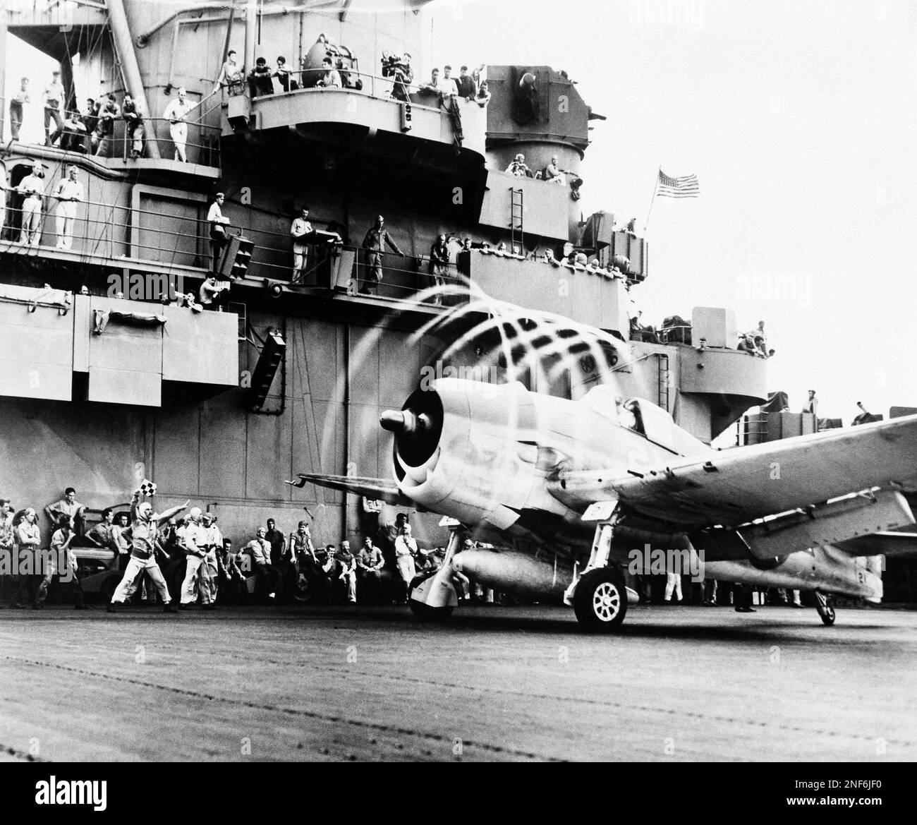 The white rings of vapor around the nose of this Grumman Hellcat plane ...