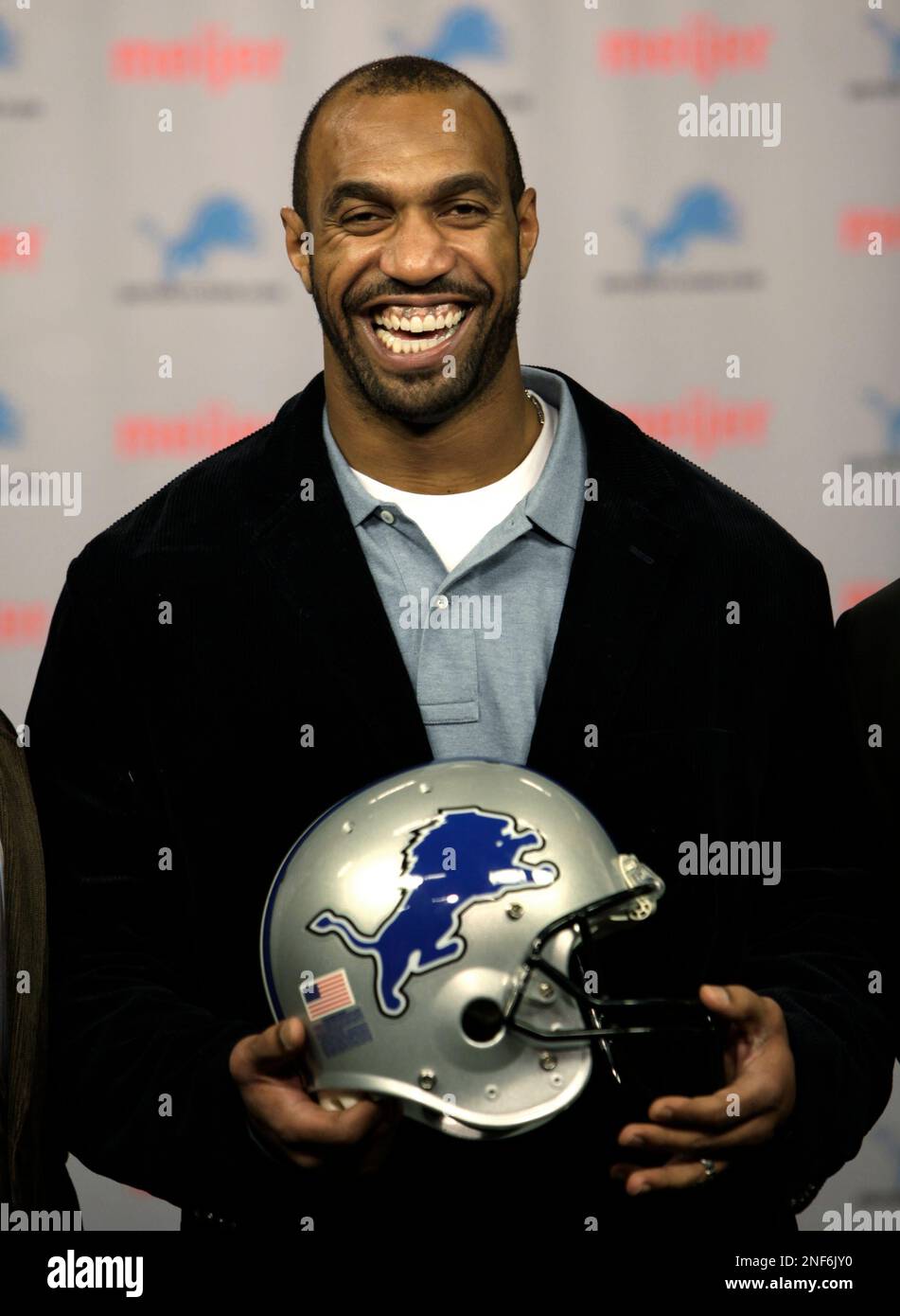 Detroit Lions linebacker Julian Peterson smiles in Allen Park, Mich ...