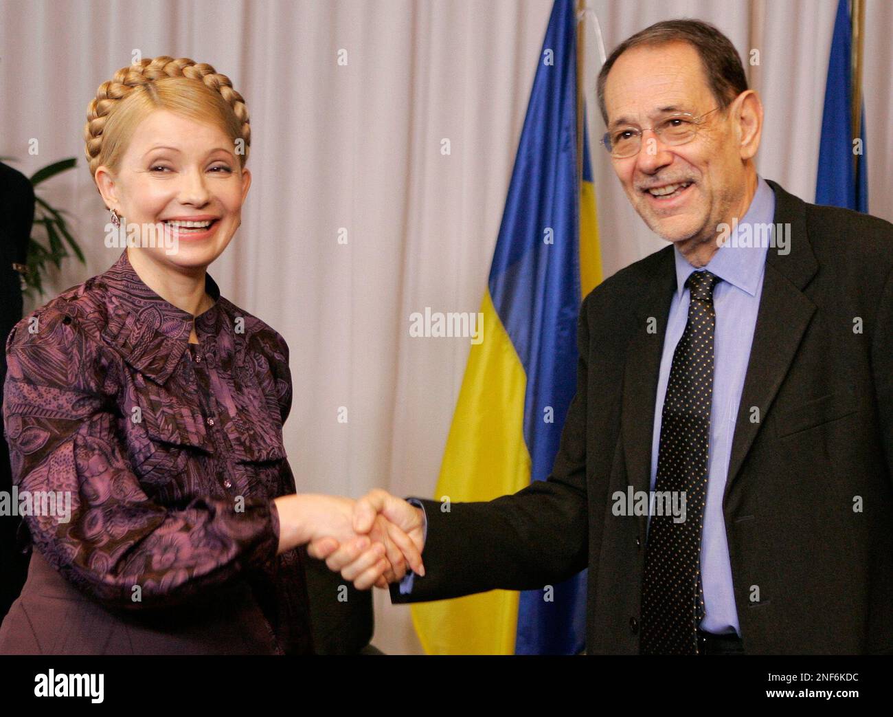 European Union foreign policy chief Javier Solana, right, shakes hands with Ukraine's Prime ...