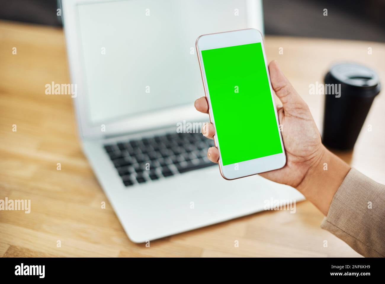 Keep the connection going strong. an unrecognizable businesswoman using ...