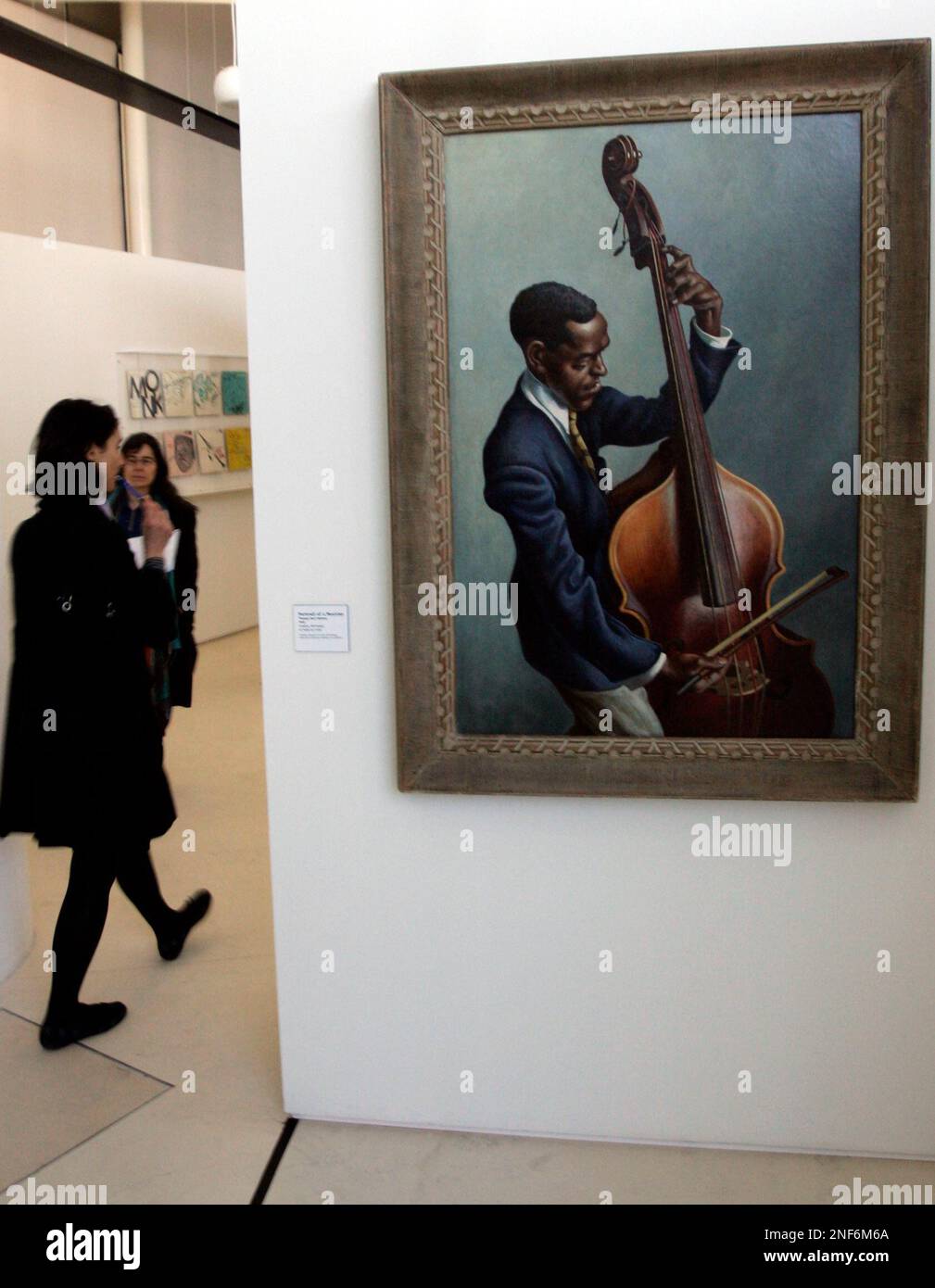 "Portrait of a Musician", 1949, by Thomas Hart Benton is displayed as ...