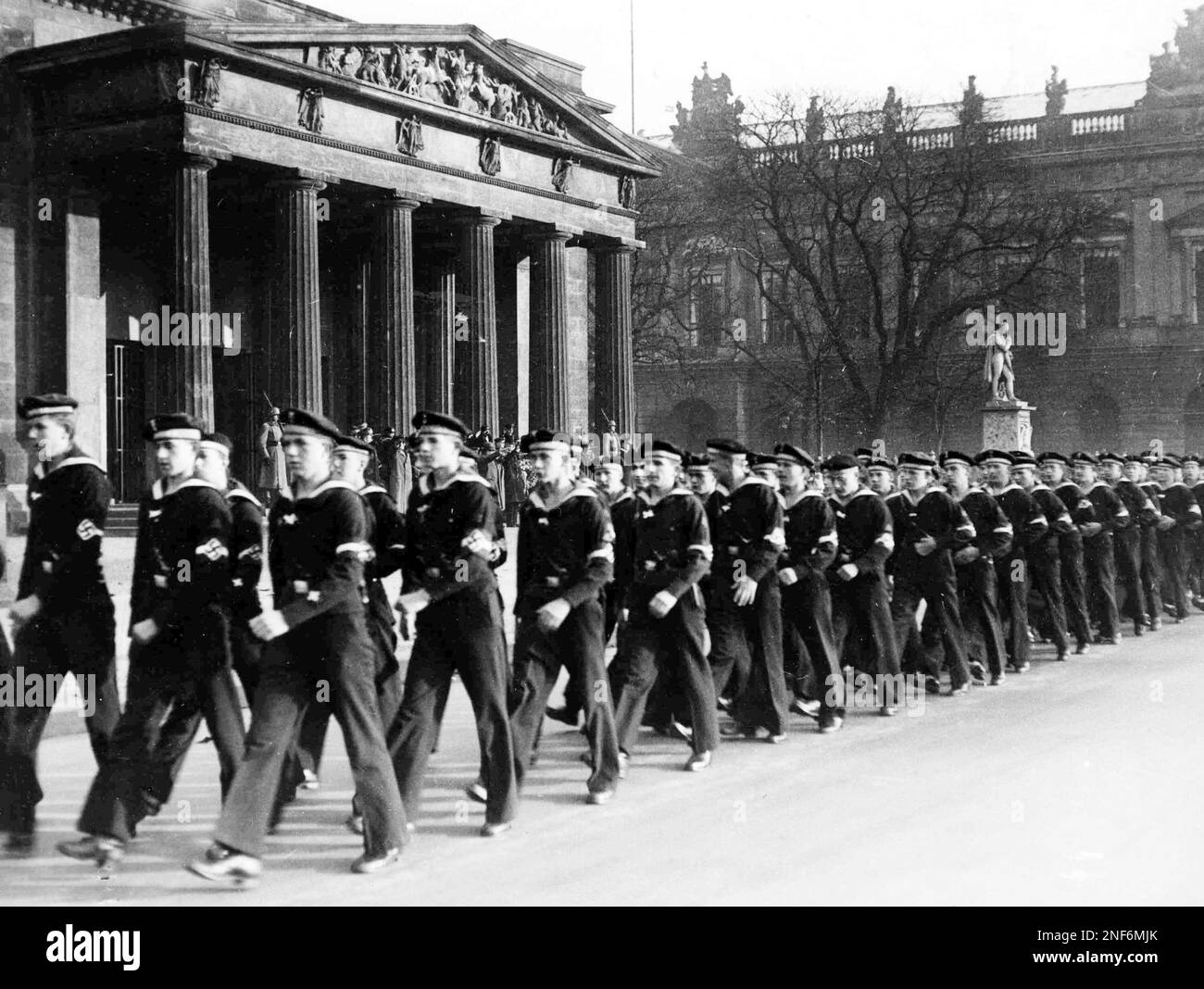Members of the Hitler Naval Youth march past the Unknown Soldiers ...