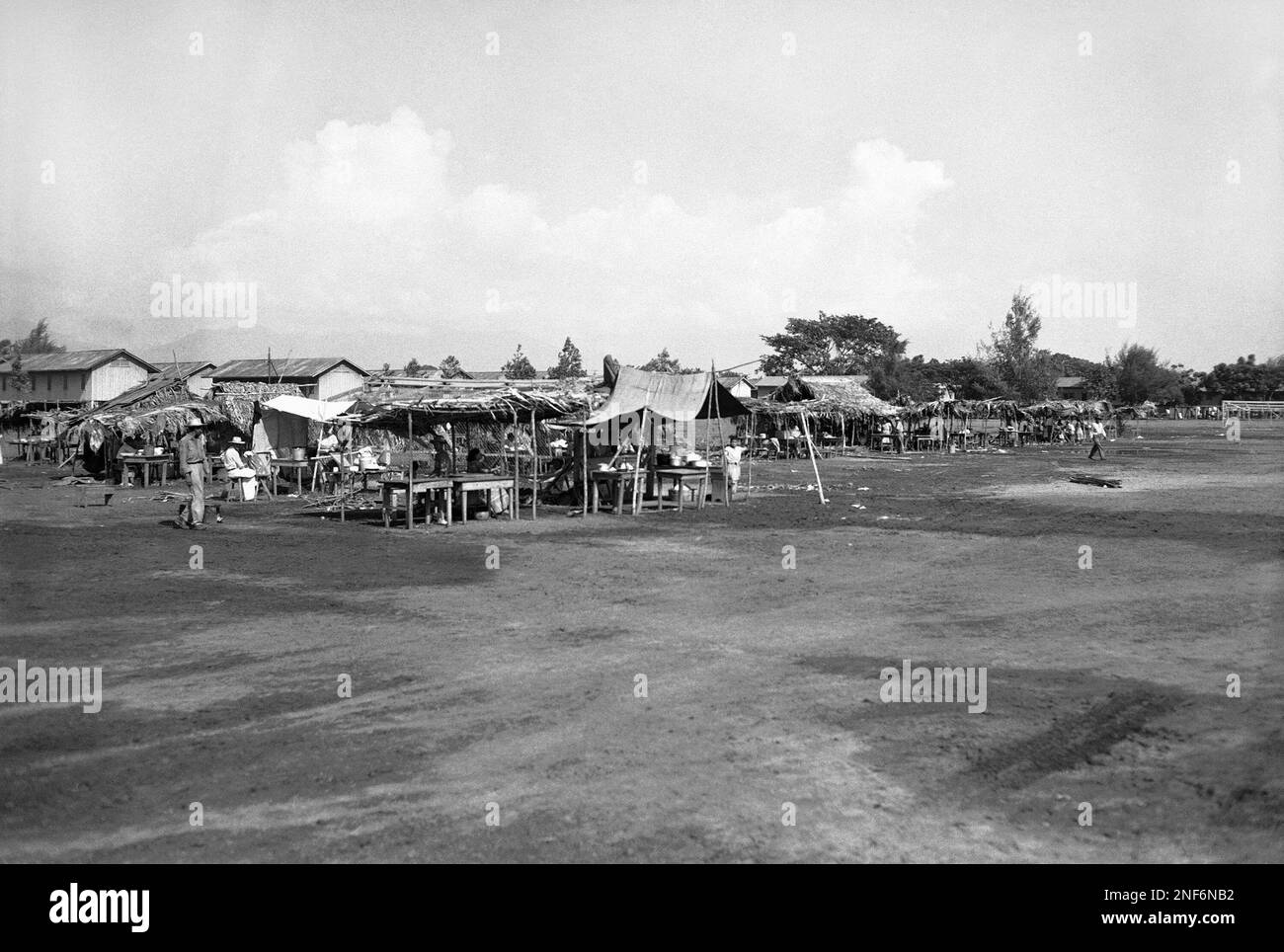 Banana workers shacks set up on the football field at La Lima in ...