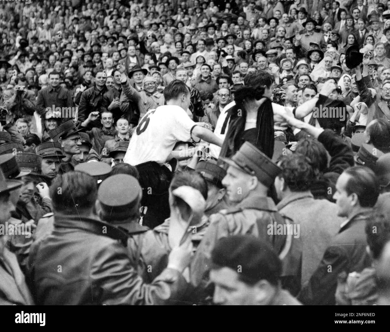 German captain Fritz Walter, partly obscure centre right, and right ...
