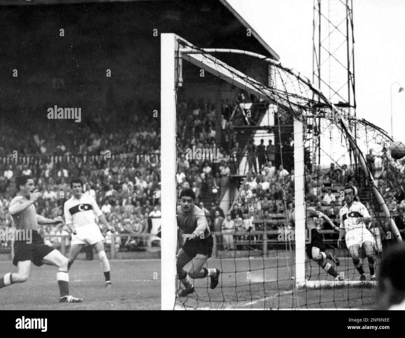 German centre forward Ottmar Walters, left, scores his country's first ...